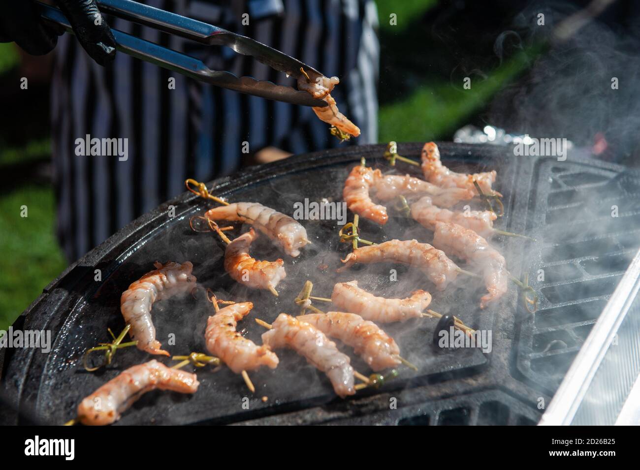 Professional cook prepares shrimps hi-res stock photography and images ...