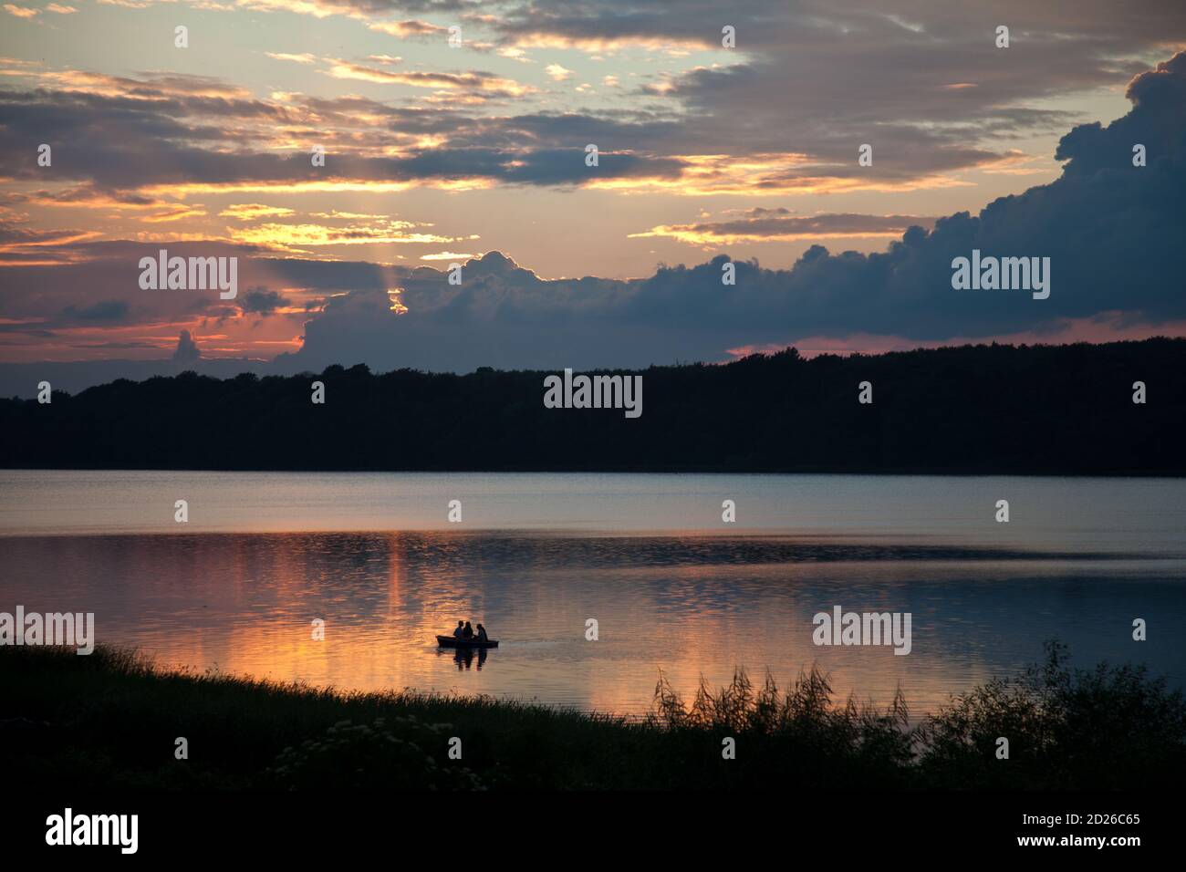 Sunset on a lake in denmark in the summer Stock Photo - Alamy