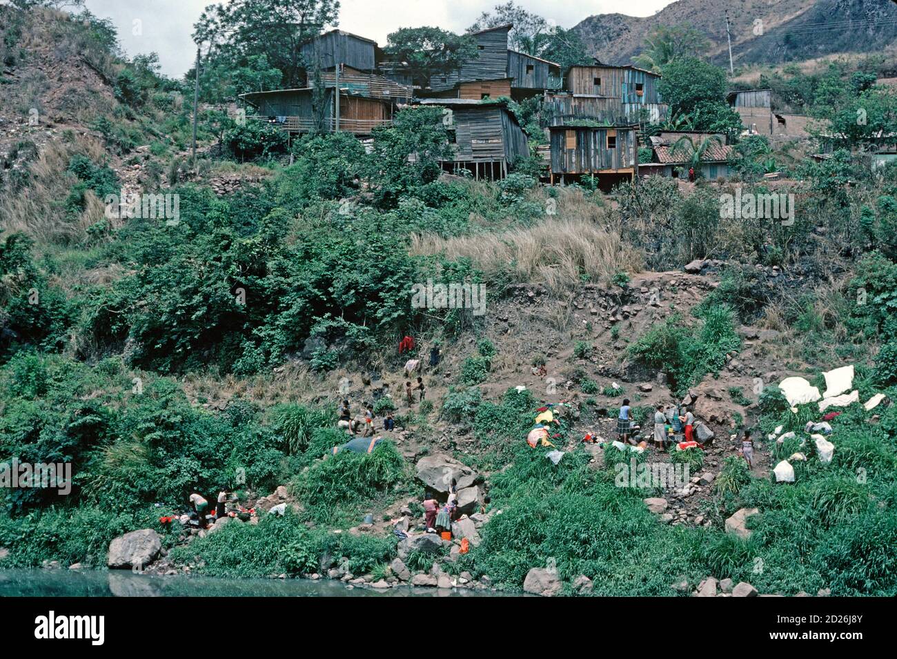 washing clothes in stream in shanty town out in Tegucigalpa suburbs ... washing clothes in stream in shanty town out in Tegucigalpa suburbs ...