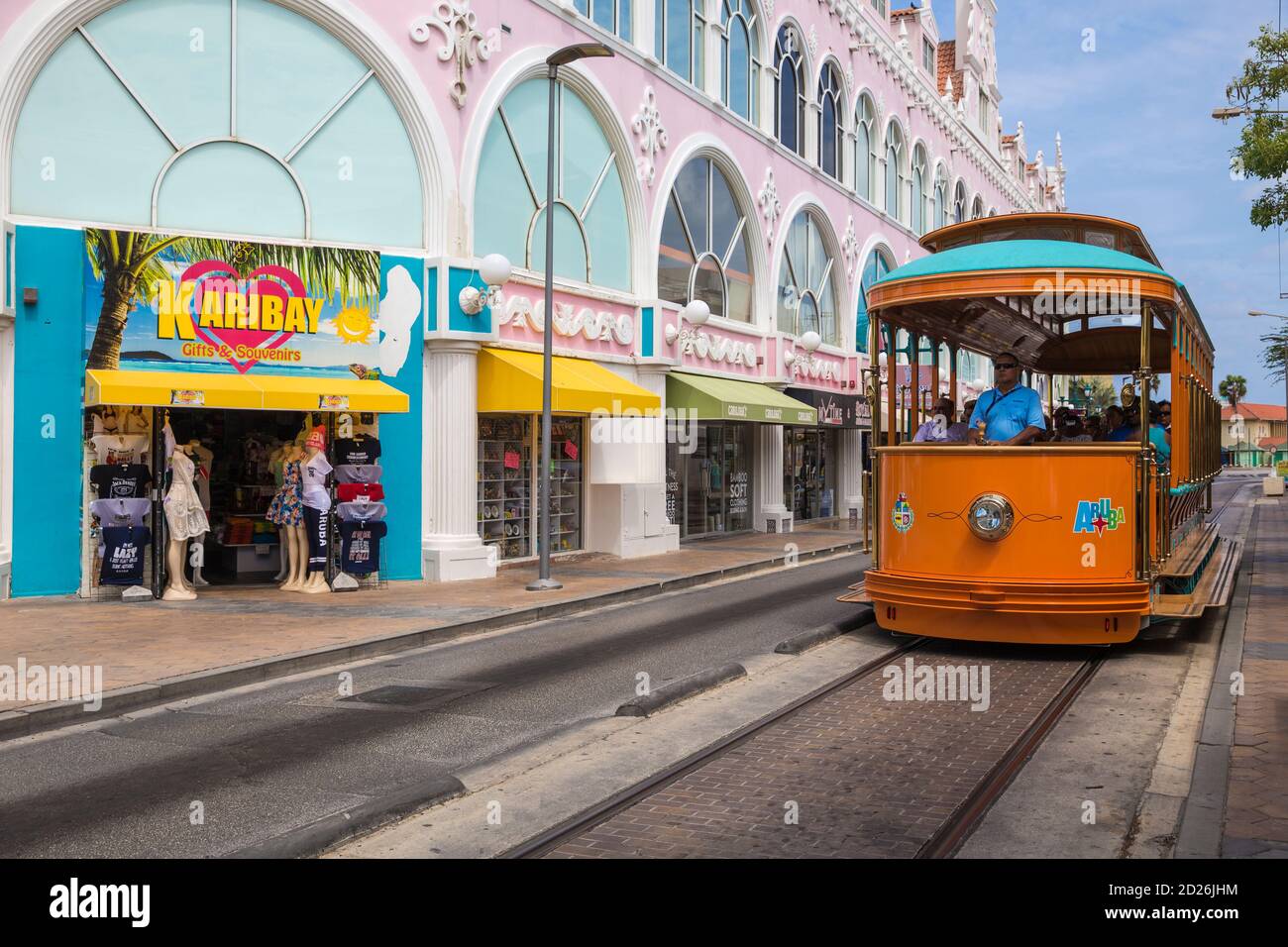 Caribbean, Netherland Antilles, Aruba, Oranjestad, Tram passing Royal ...