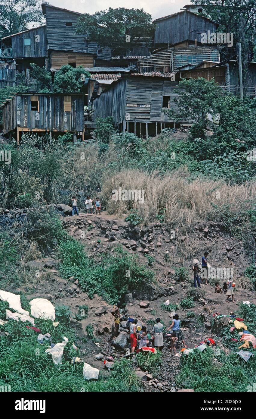 washing clothes in stream in shanty town out in Tegucigalpa suburbs ... washing clothes in stream in shanty town out in Tegucigalpa suburbs ...