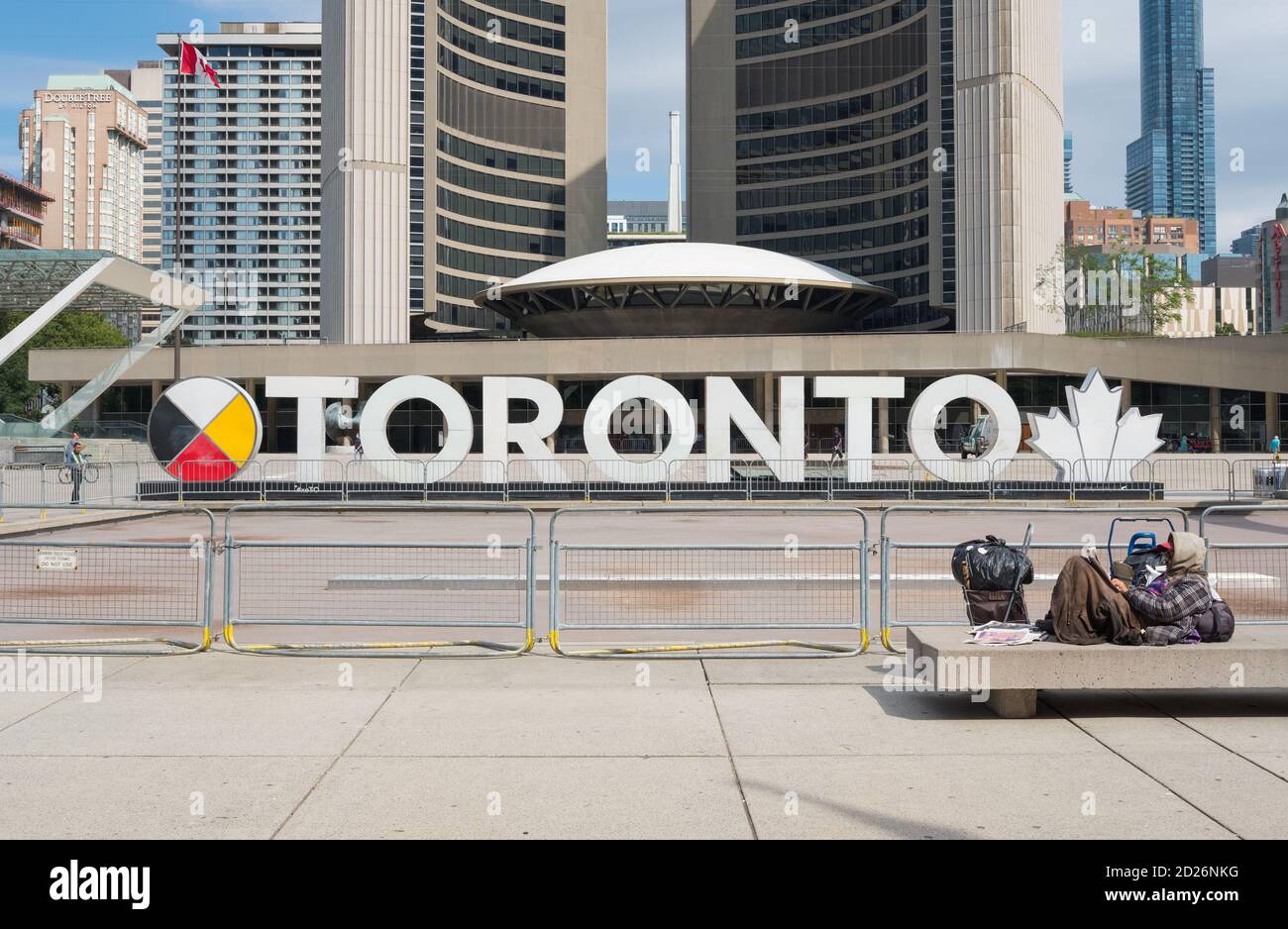 Rough sleeper in front of the 3D Toronto Sign, Nathan Phillips Square ...