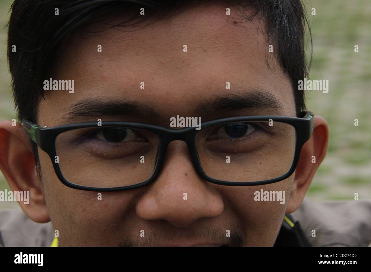 Young indonesian man portrait hi-res stock photography and images - Alamy