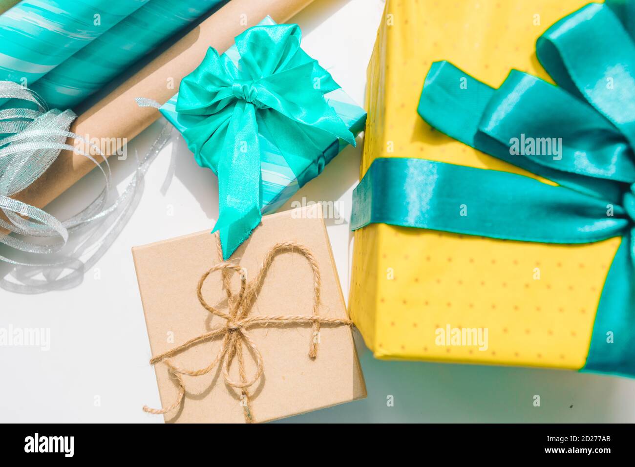 packing gift box with wrapping paper Stock Photo - Alamy