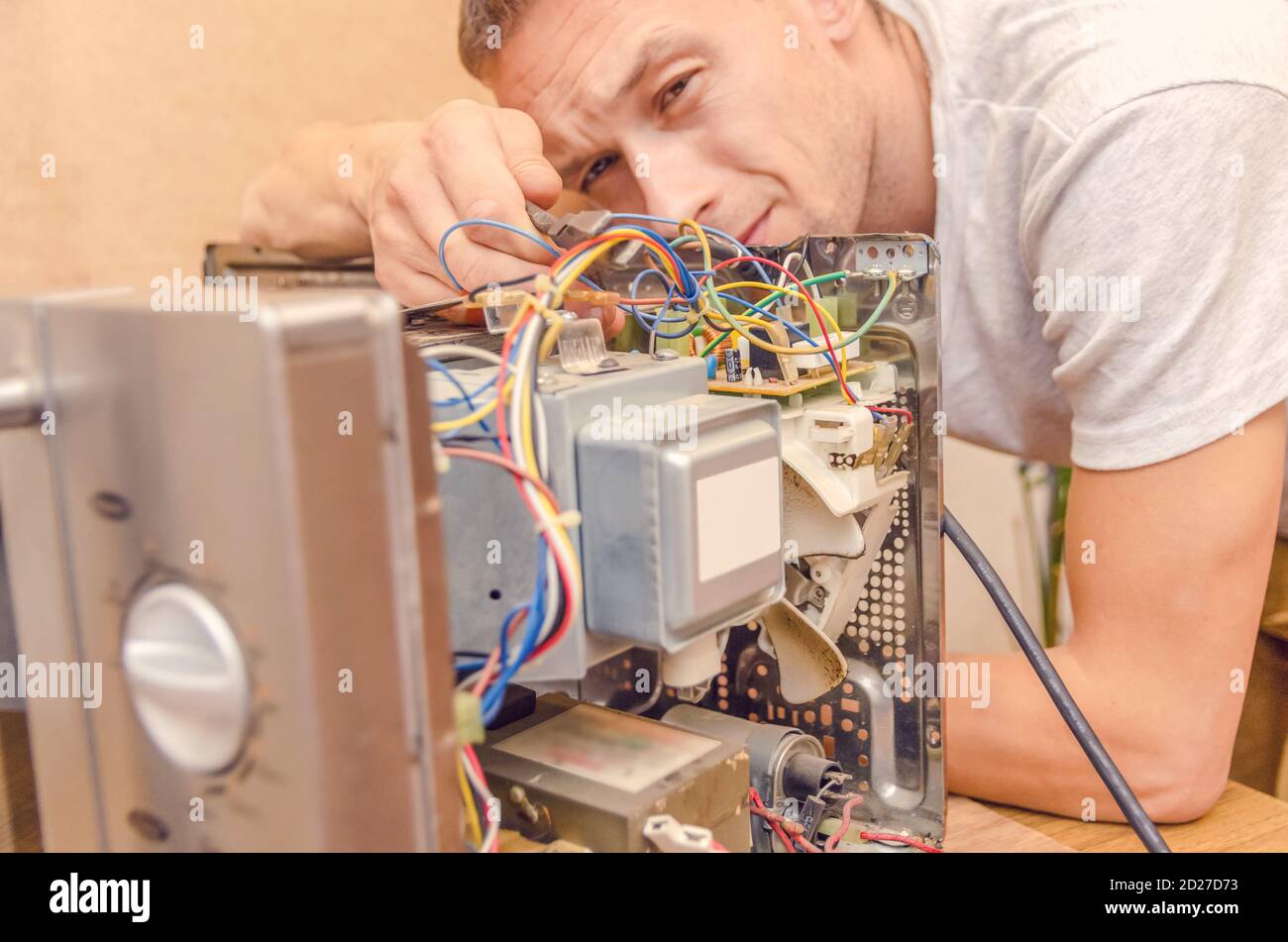 Broken microwave hi-res stock photography and images - Alamy