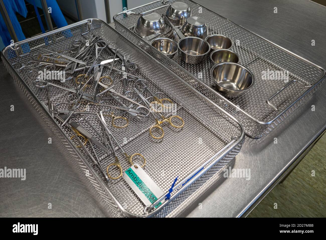 various cleaned and disinfected surgical instruments lie unsorted in ...