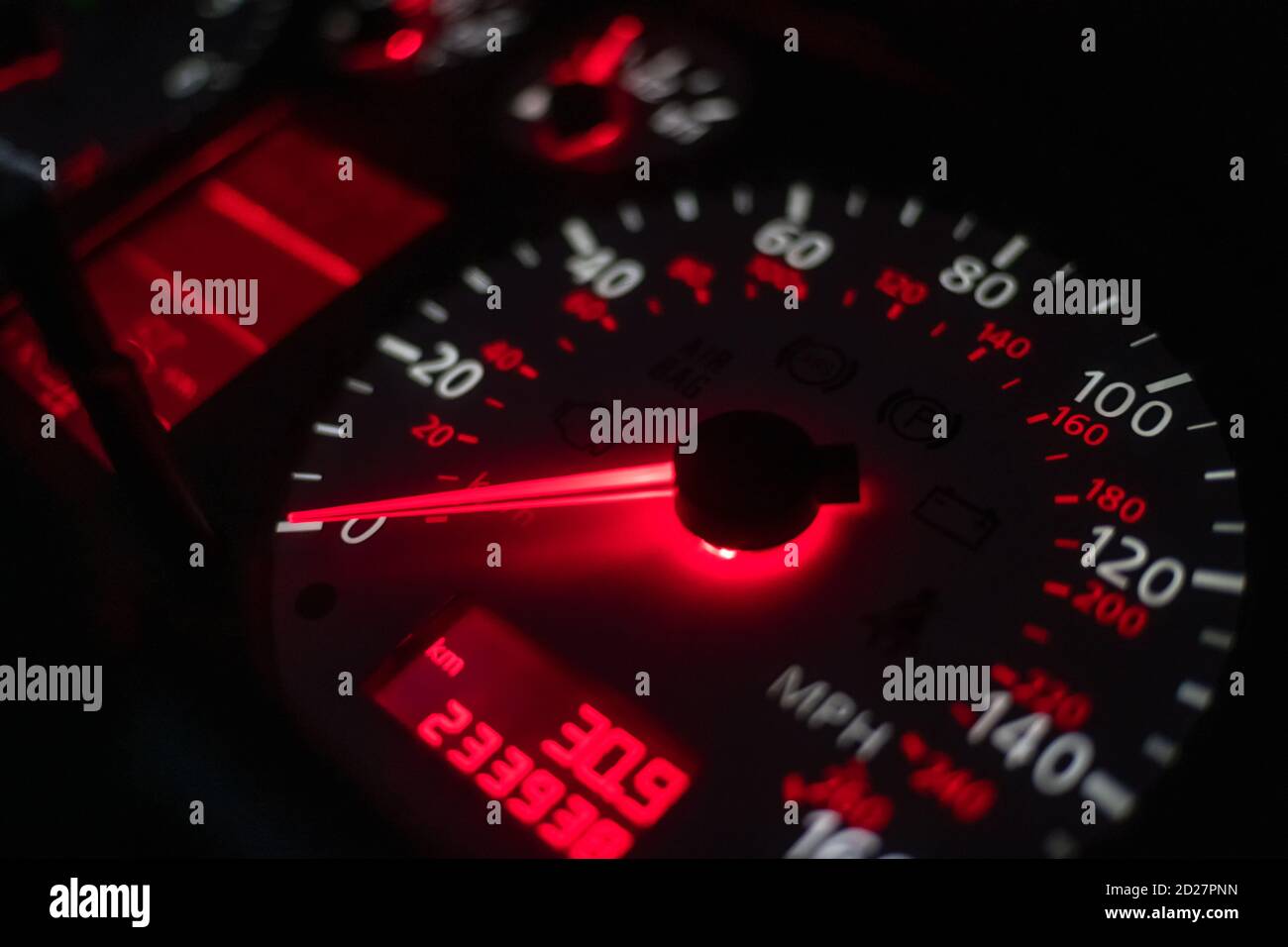 car dashboard. Speedometer with red backlight at night close up Stock ...