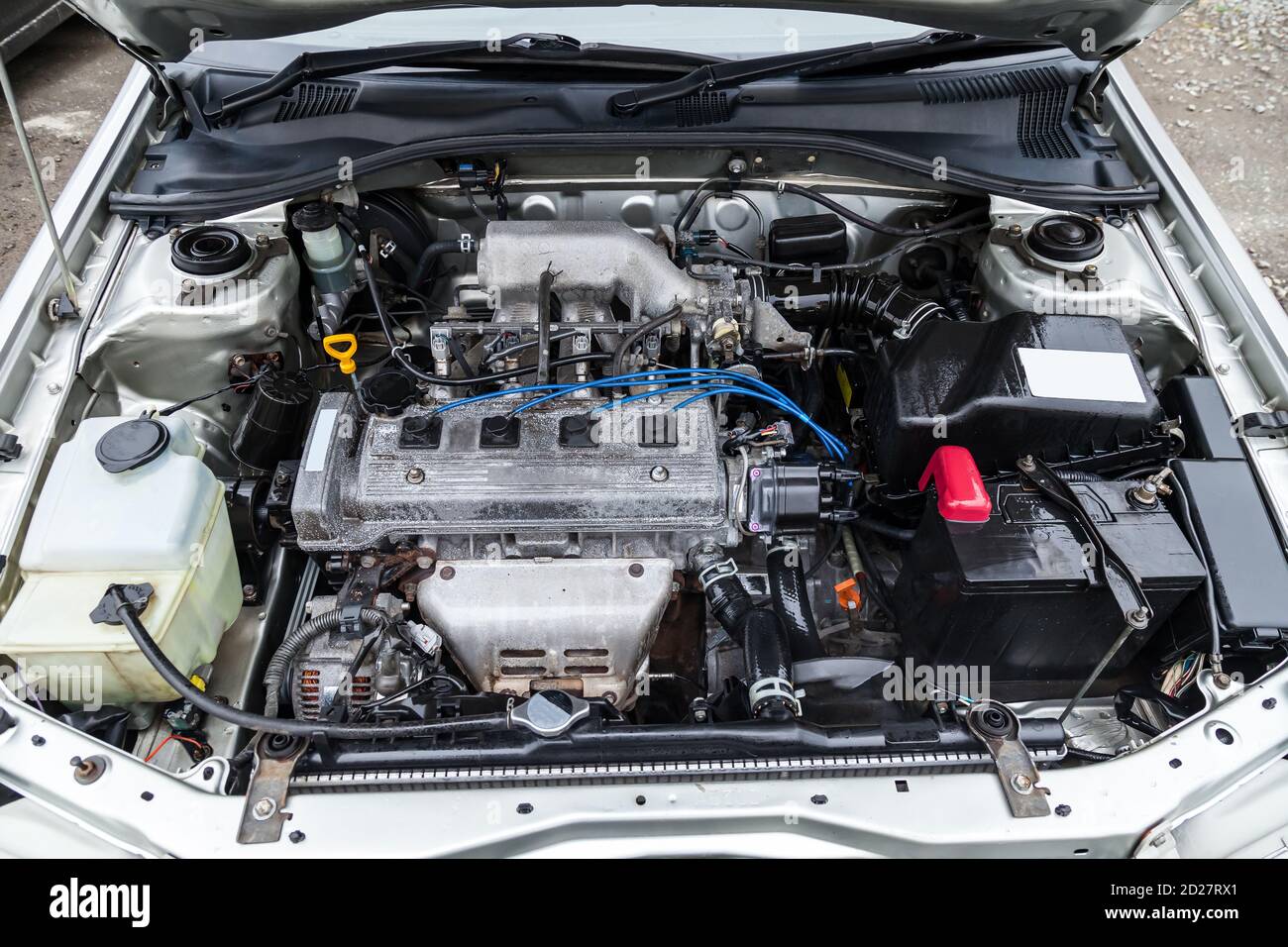 Under hood space of used car in a workshop for the repair and ...