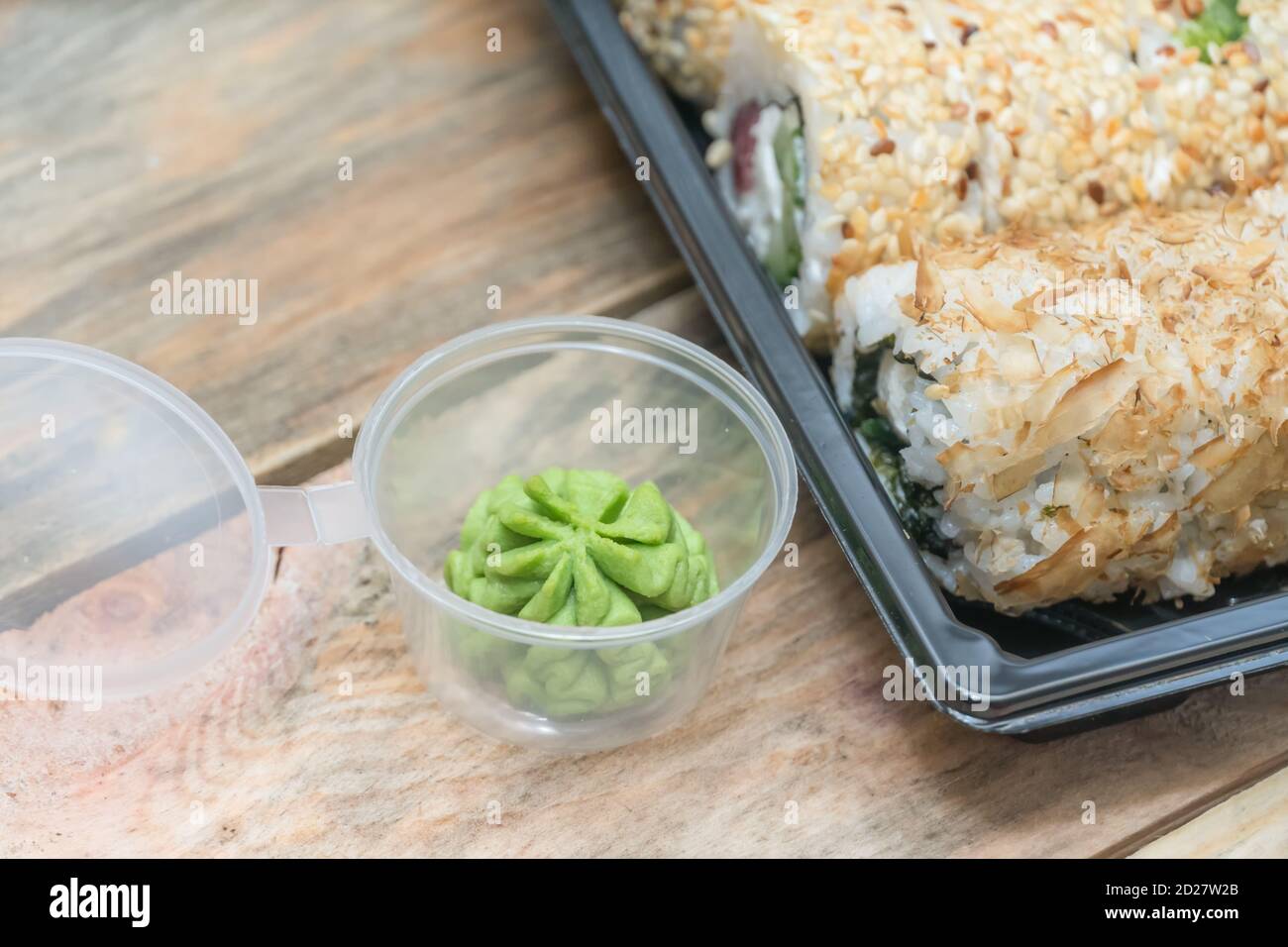 Set sushi Toto Maki, Bonito Maki, Akito Maki wasabi on a wooden ...