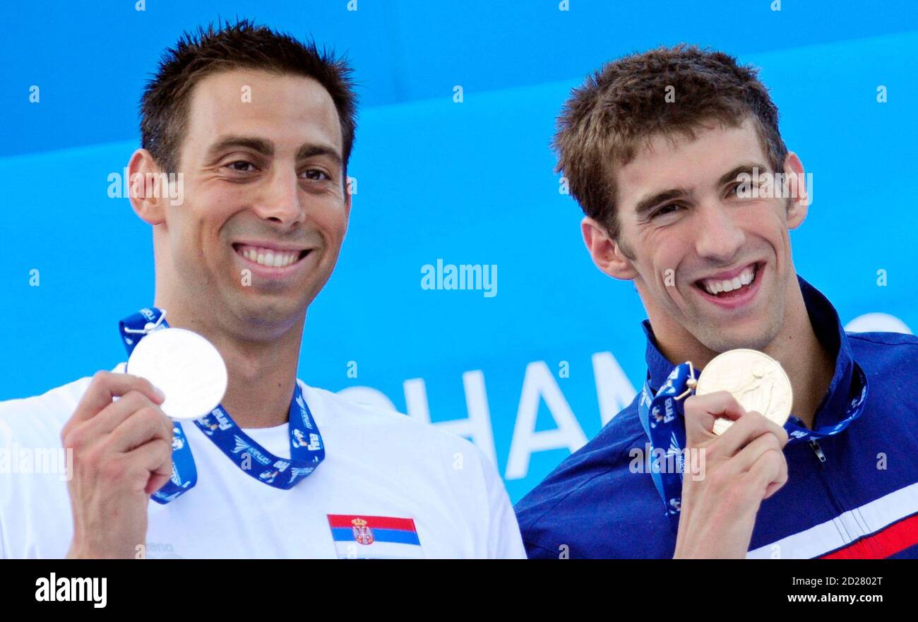 Michael phelps medals pose hi-res stock photography and images - Alamy
