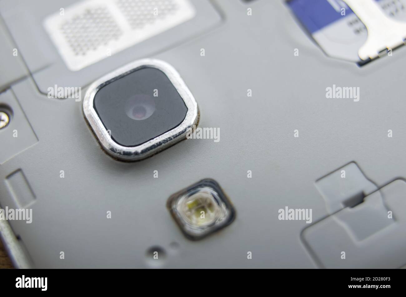 Close up view of camera inside smartphone and motherboard Horizontal ...