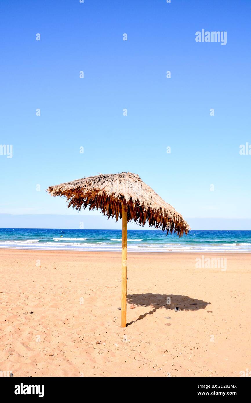 Tropical Beach Umbrella Stock Photo - Alamy