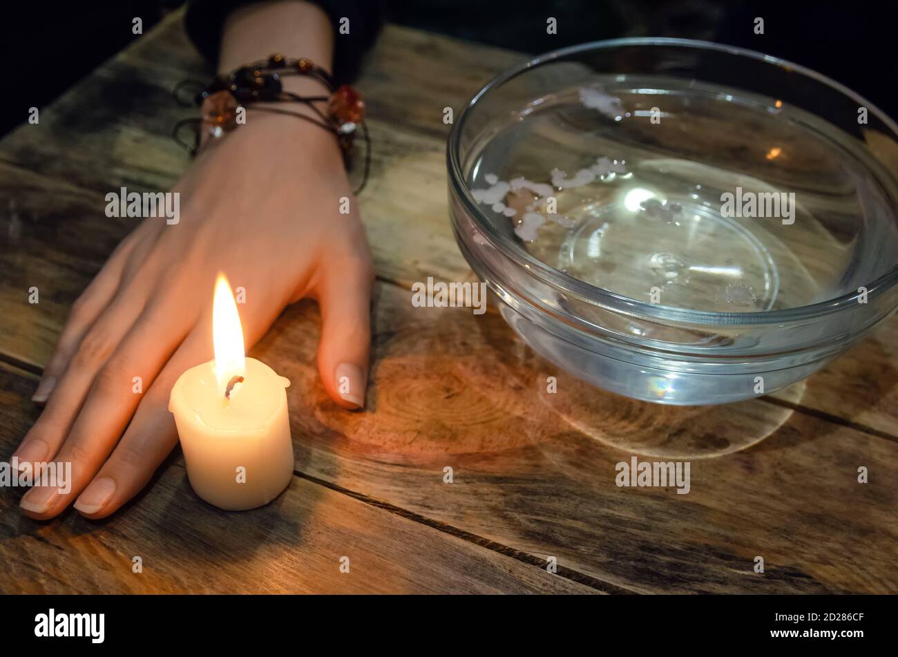 Divination with a candle on the water. concept of magic, divination ...