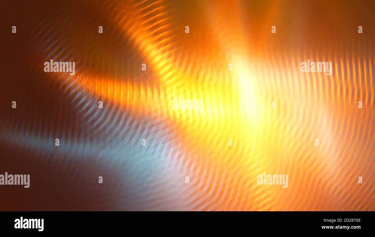 Vibrant golden light sources with glass texture for background or ...