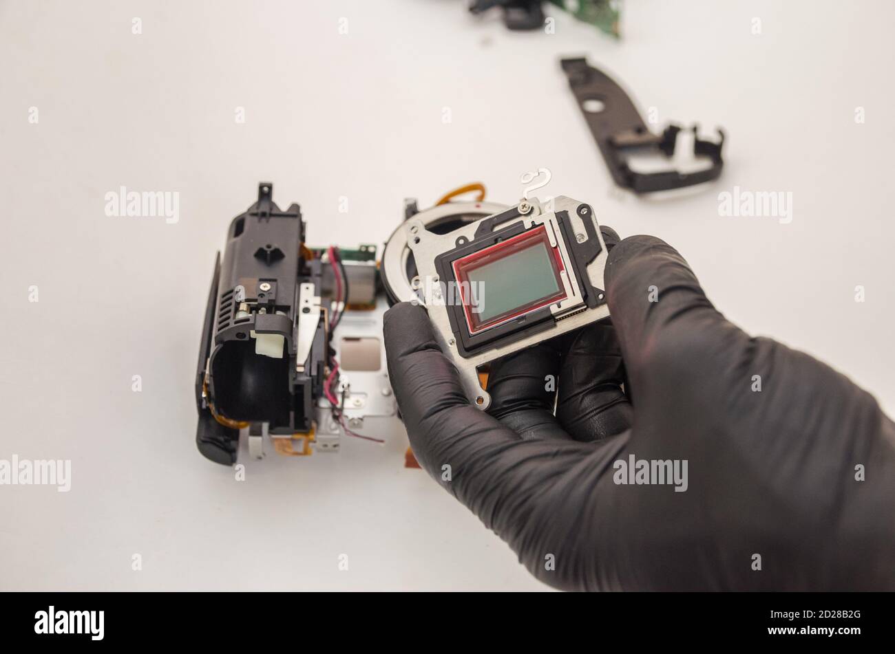 Repair matrix camera. The matrix is in the hands of a master Stock ...