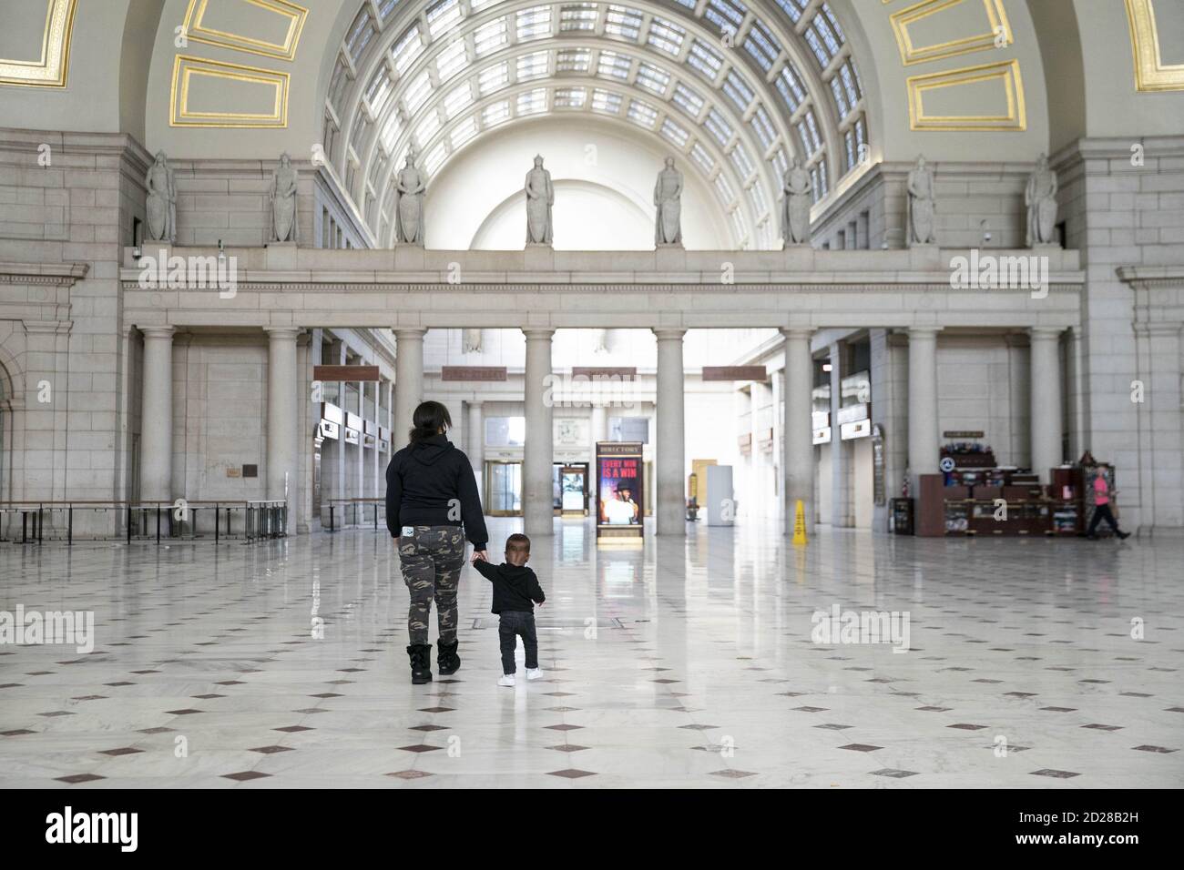 Woman seen walking child hi-res stock photography and images - Alamy