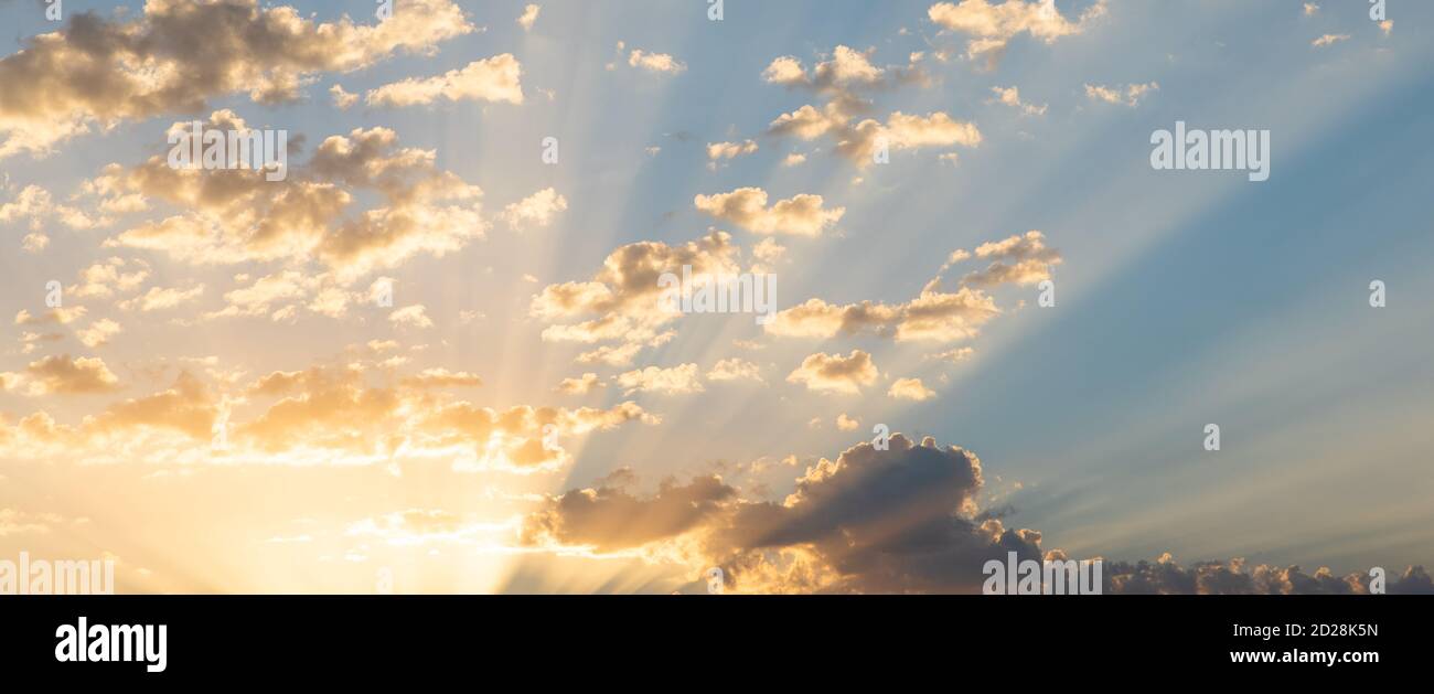 Beautiful sunrise with sun rays shining through the clouds. Background ...