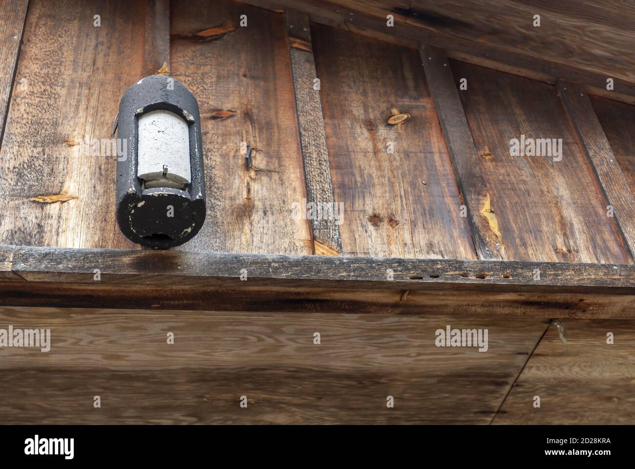 Closeup shot of a weathered structure on a wooden wall Stock Photo - Alamy