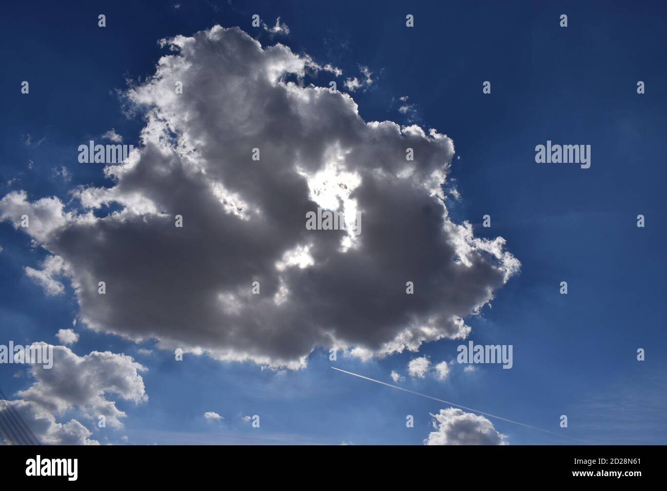 sun behind a cloud Stock Photo - Alamy