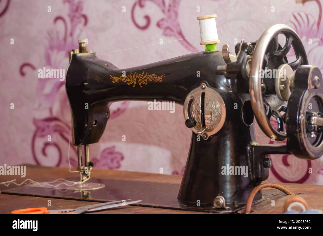 Old vintage sewing machine close up, work Stock Photo - Alamy