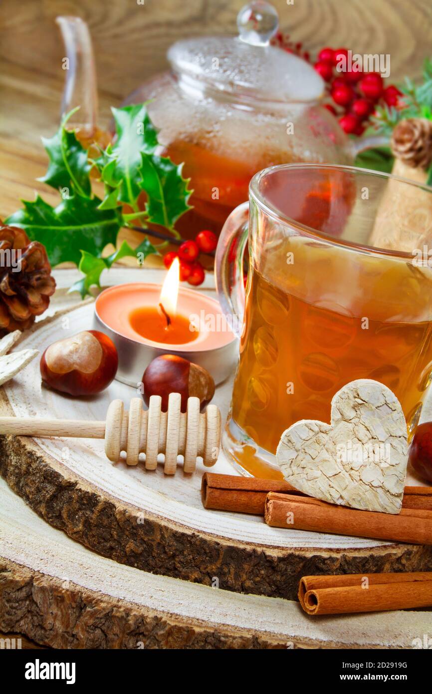 Tea time cup and cinnamon with heart Stock Photo - Alamy