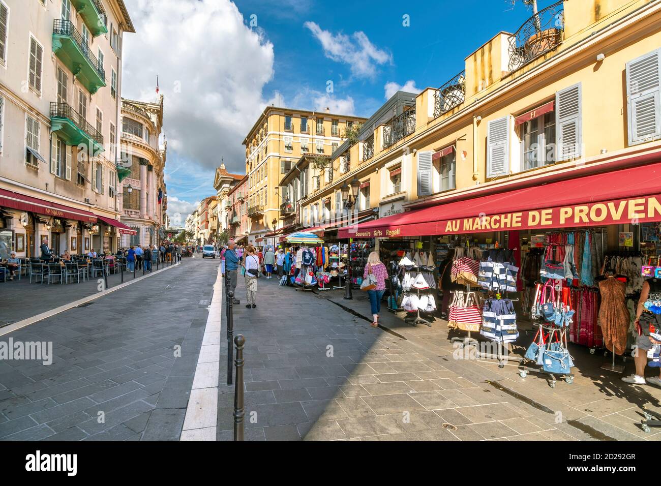 A wide street of shops and cafes in the tourist center of Nice, France ...