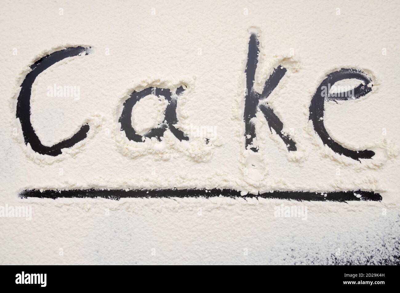 words Food written on a black background with flour. Inscription Stock ...