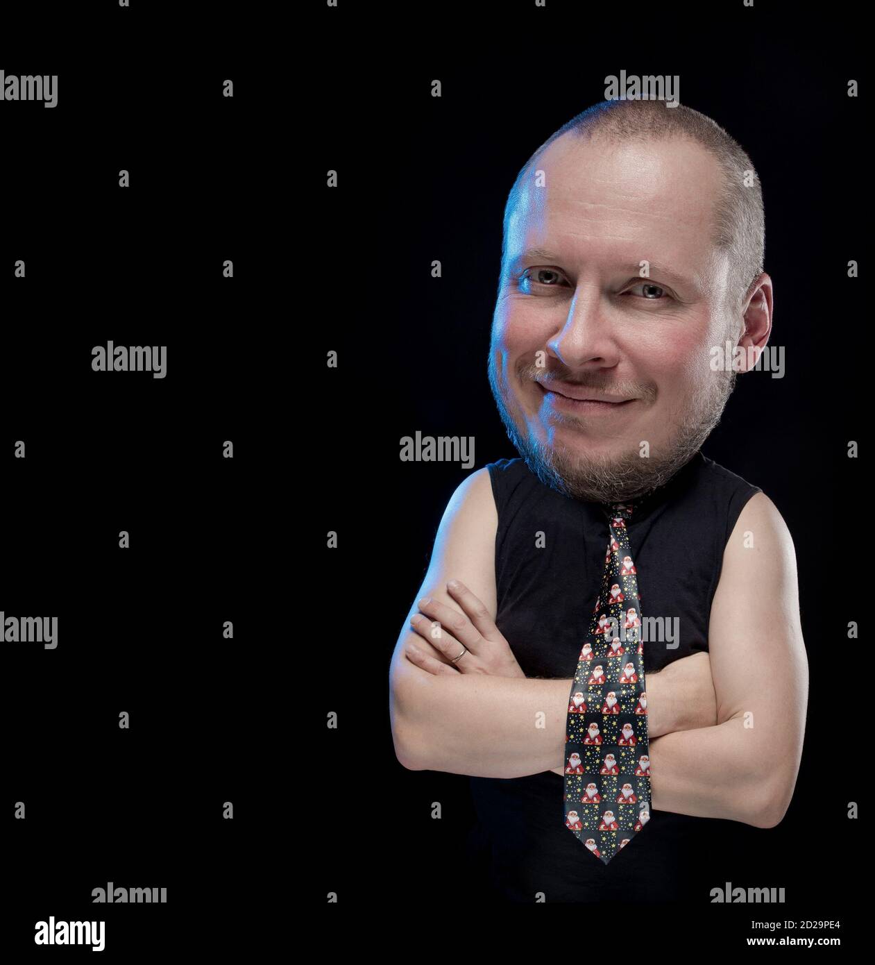 Emotional comic actor gesturing man in a tie on a black background ...