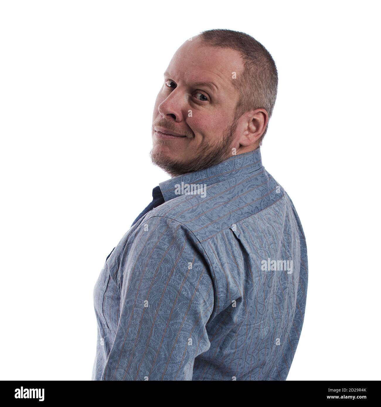 emotional actor man in a gray shirt posing on a white background in ...
