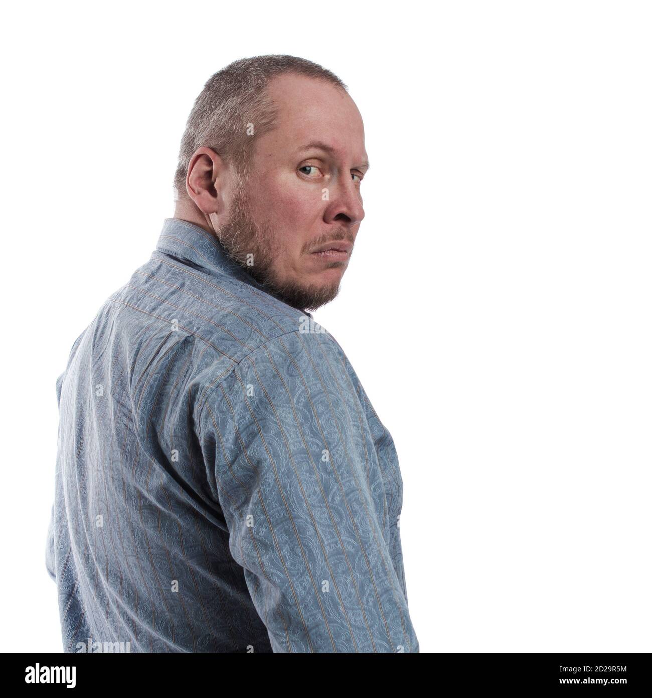 emotional actor man in a gray shirt posing on a white background in ...