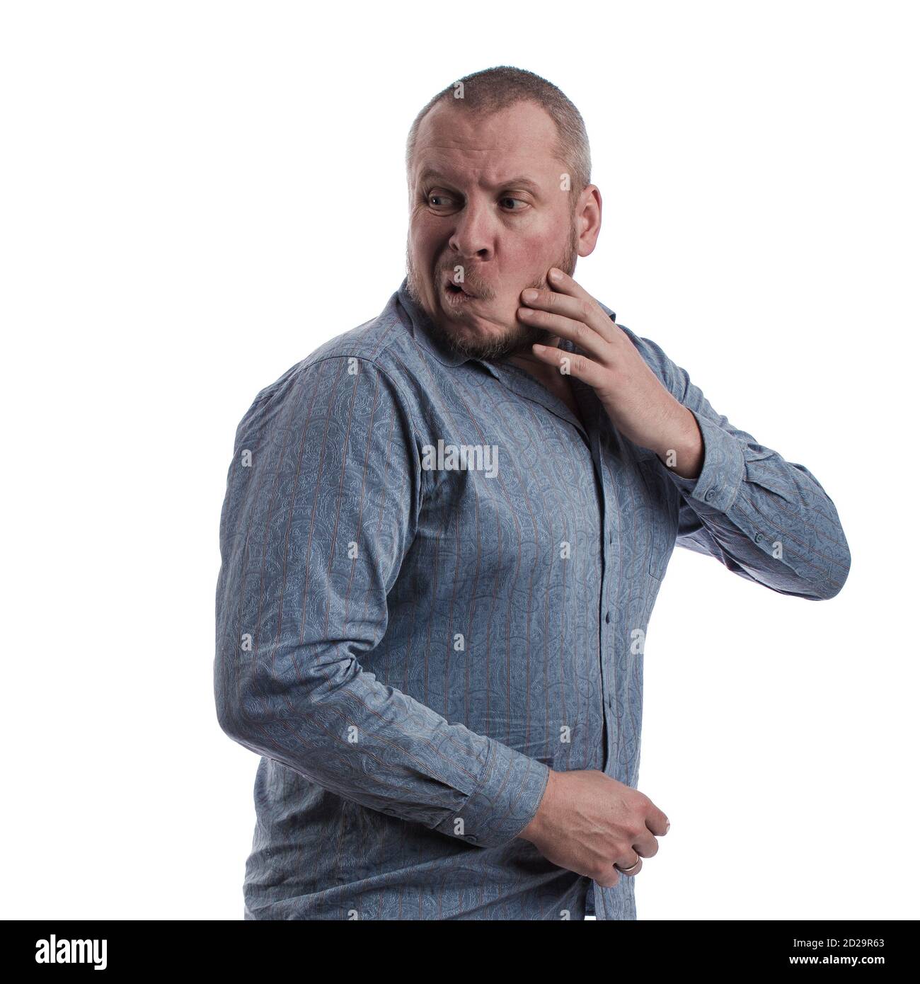 emotional actor man in a gray shirt posing on a white background in ...