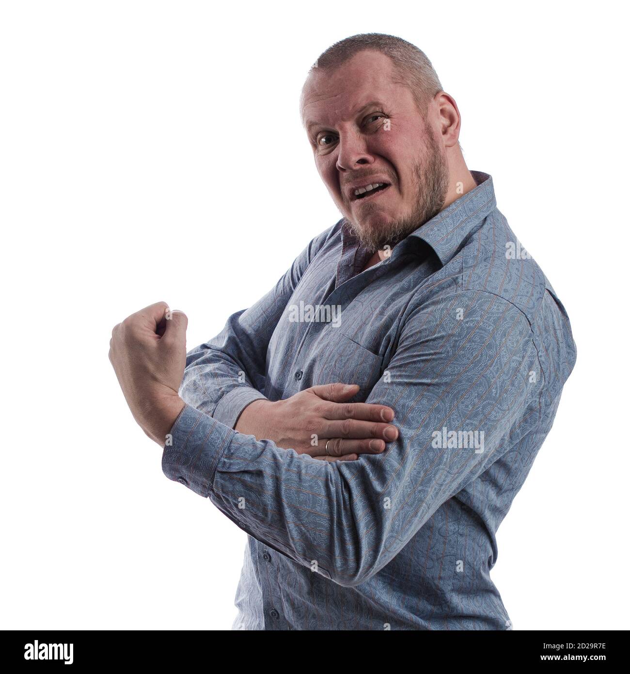 emotional actor man in a gray shirt posing on a white background in ...