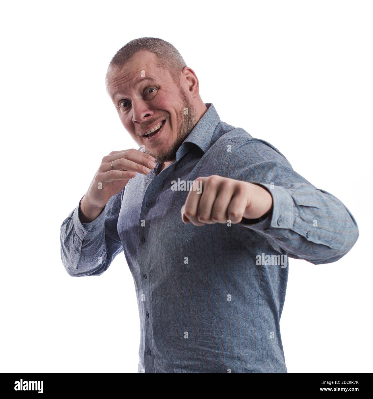 emotional actor man in a gray shirt posing on a white background in ...