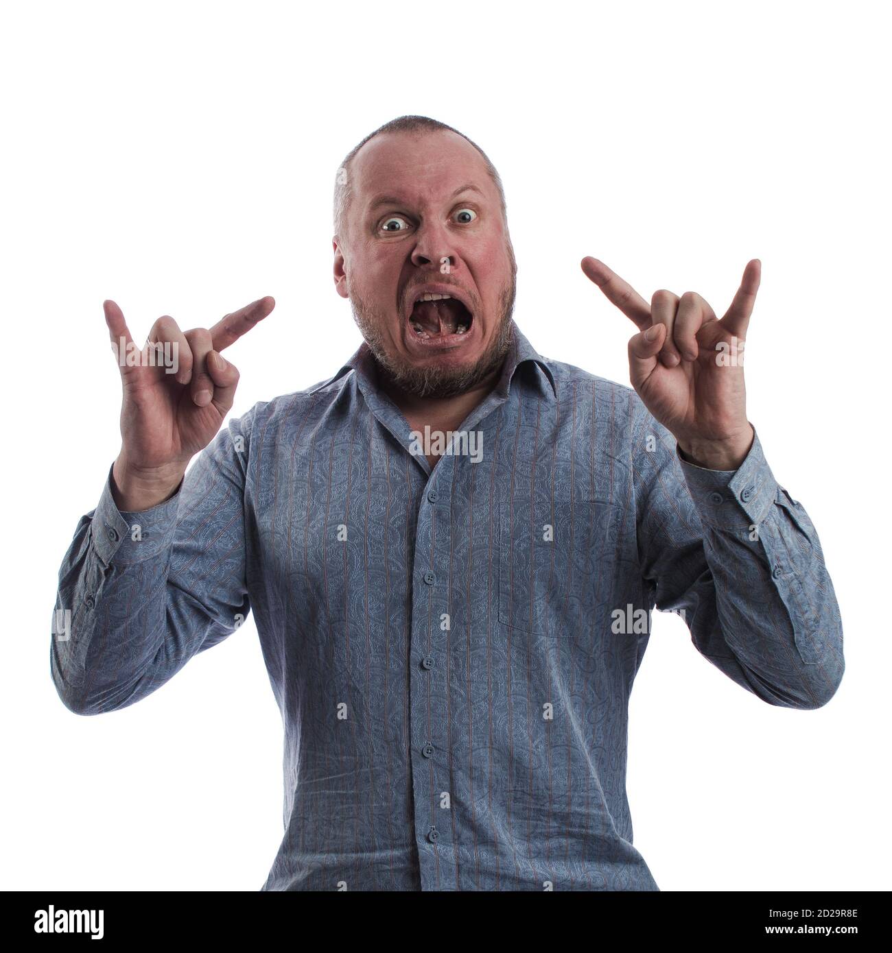 emotional actor man in a gray shirt posing on a white background in ...
