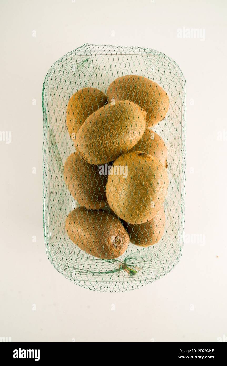 Kiwi in a box isolated Stock Photo - Alamy