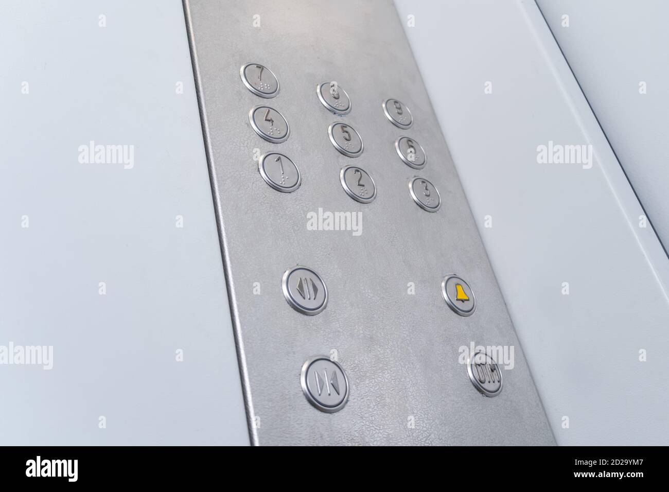 Elevator buttons with Braille, the system highlights the button for the ...