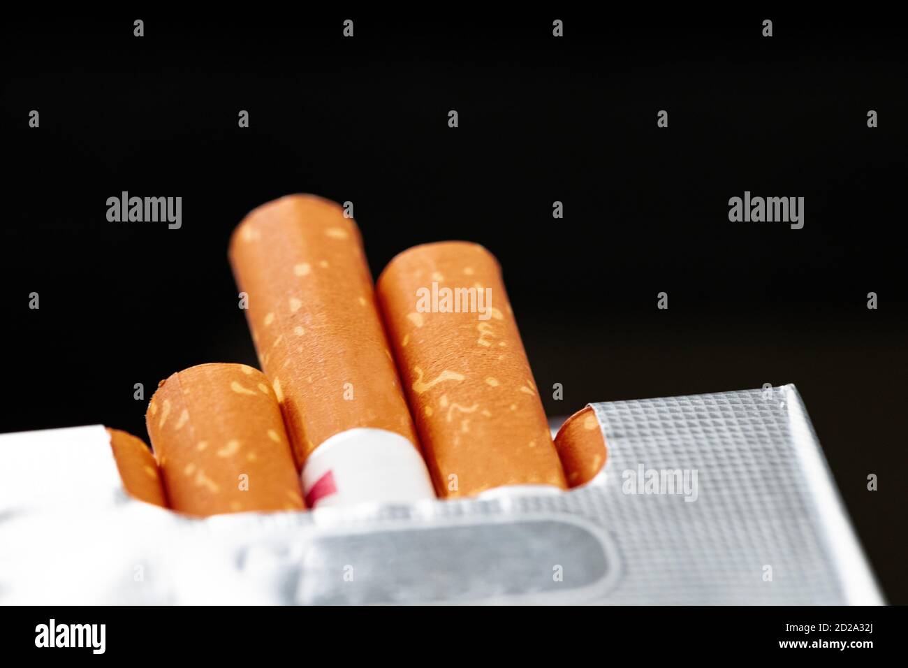 Open new pack of cigarettes close up Stock Photo - Alamy