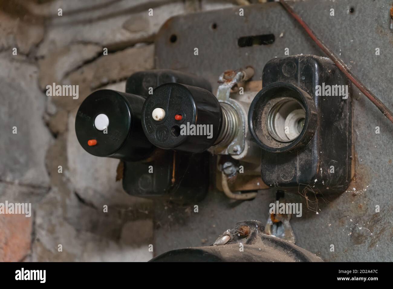 Fuses, plugs of an old Soviet electricity meter on the wall close-up ...