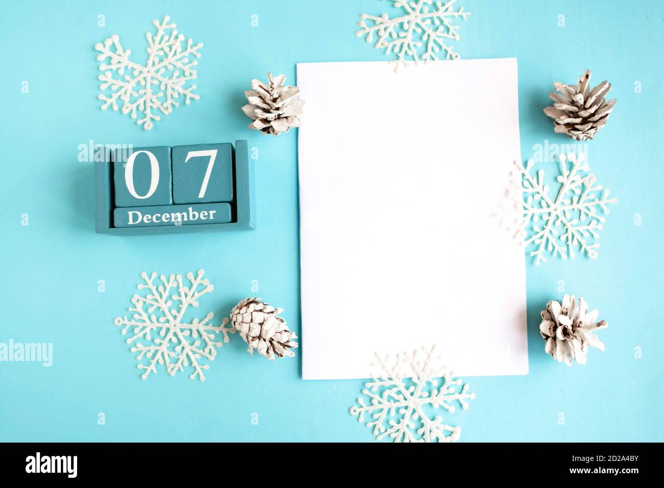 December 7. Blue cube calendar with month and date and white mockup ...