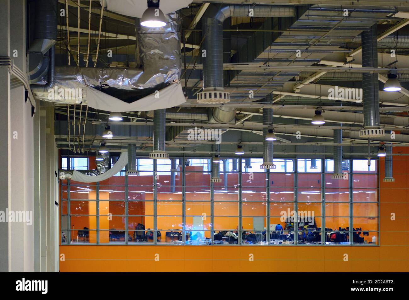Office room under the ceiling of an industrial building Stock Photo - Alamy