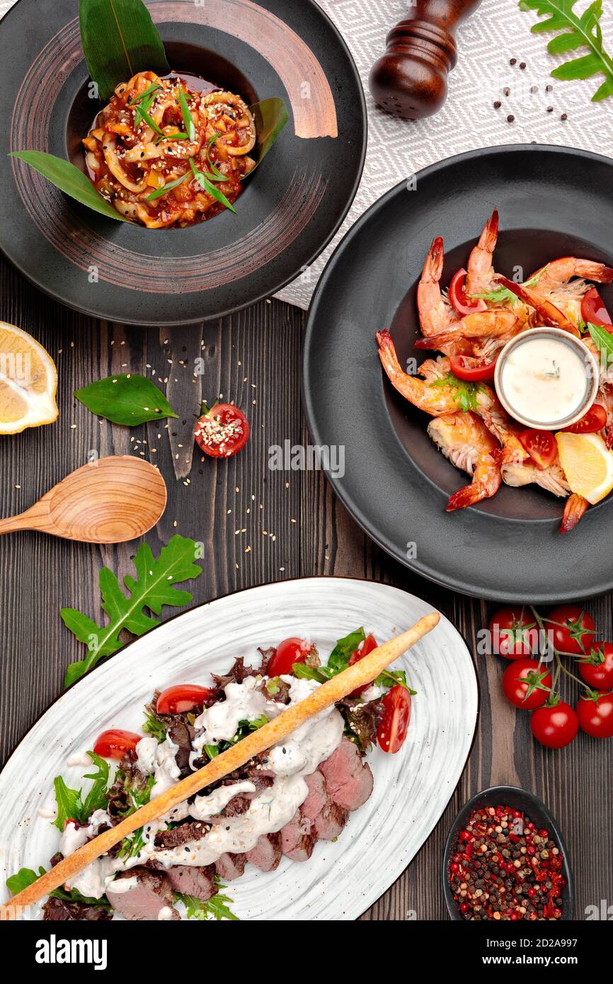 Top view of a cooked served dishes of restaurant's menu Stock Photo - Alamy