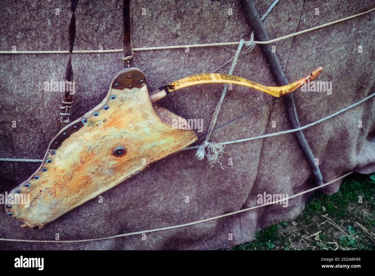 Quiver with bow hanging on a temporary dwelling of the nomadic tribe ...