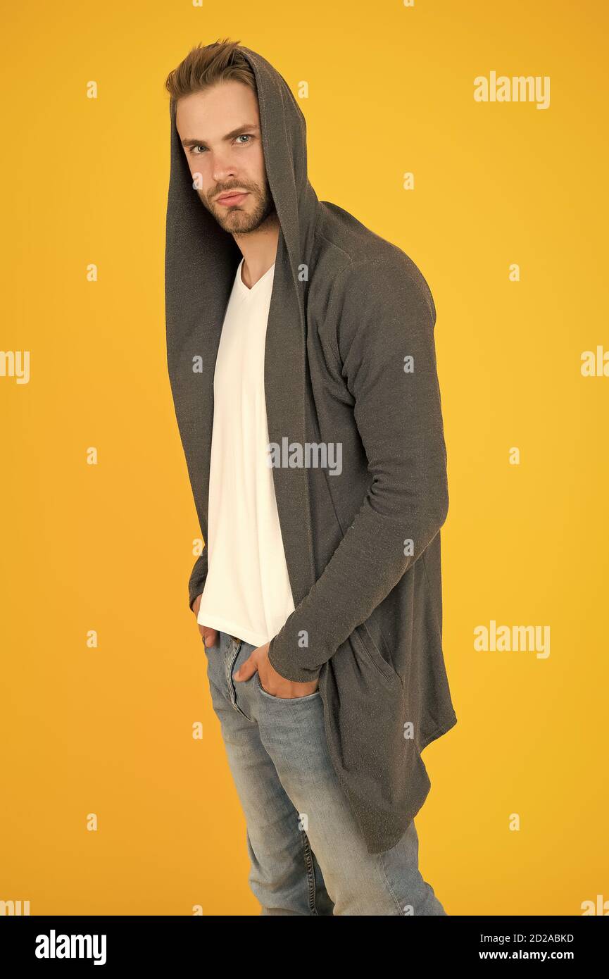 Fashion design gives sporty feel. Fashion man yellow background ...