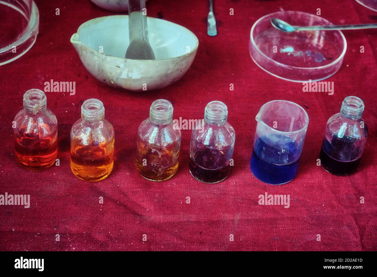 Jars with colorful reagent in an old chemical laboratory. Chemicals in ...