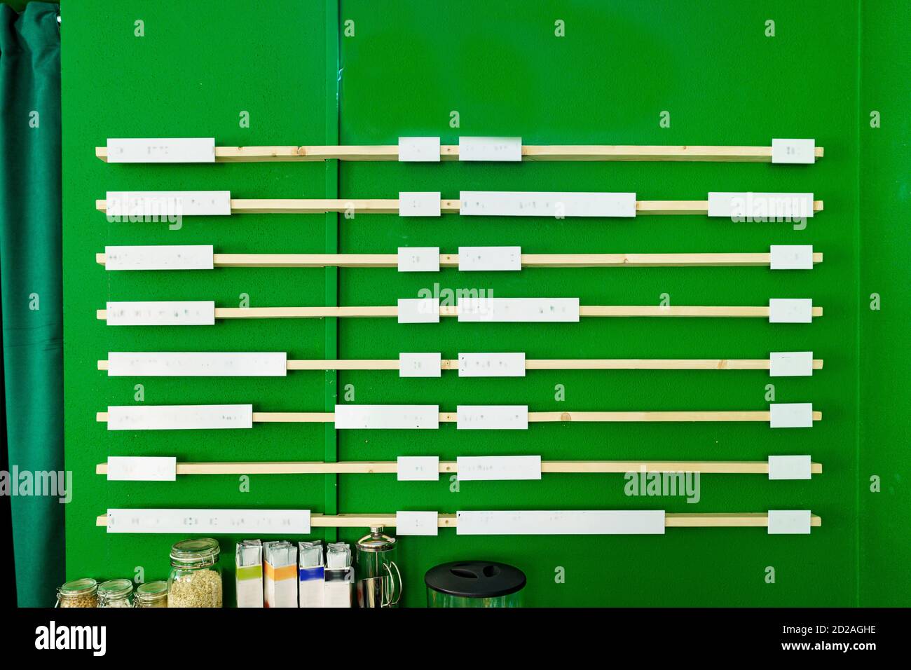 Green wall with blank coffee shop or bar menu with copy space Stock ...