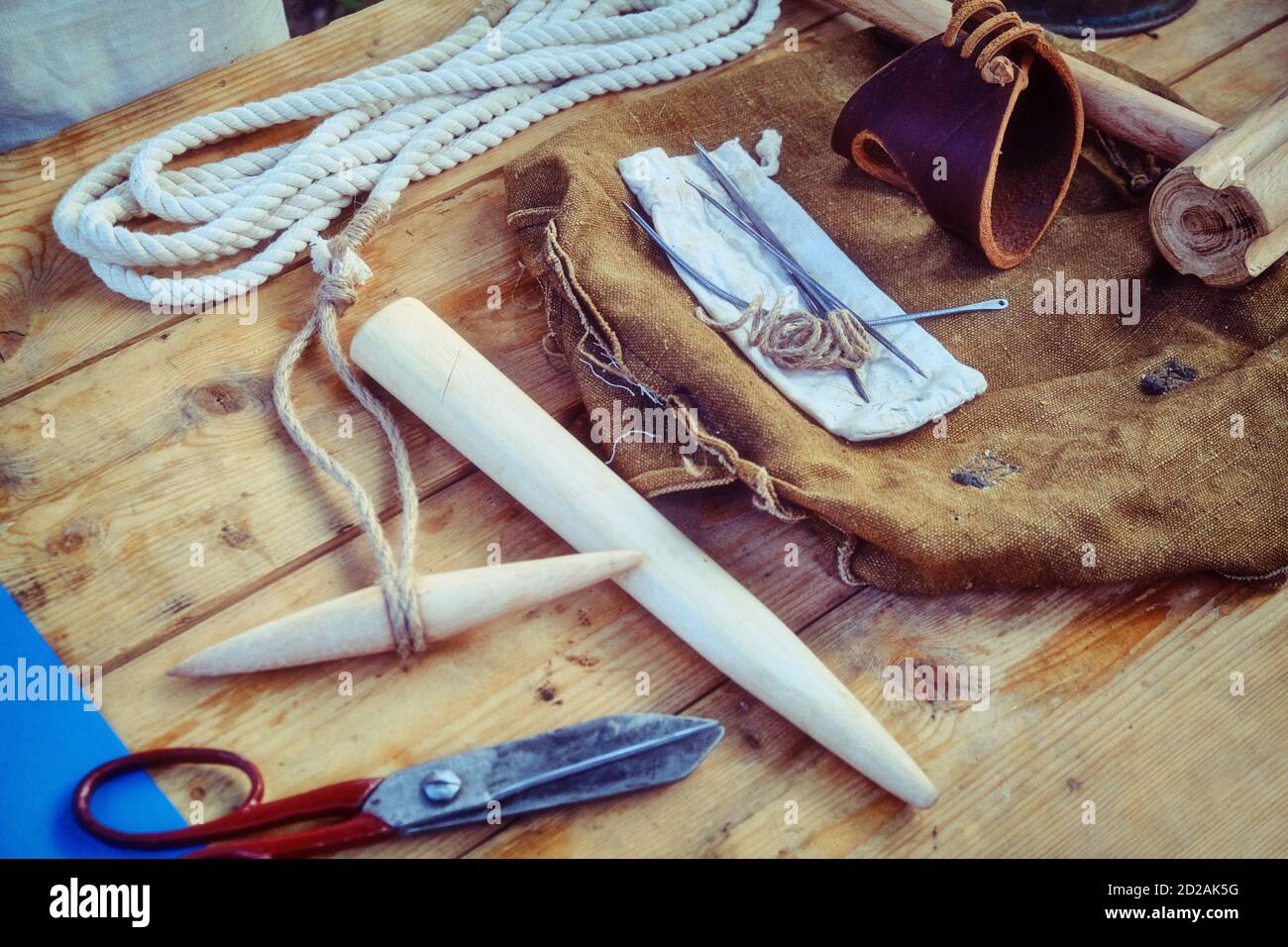 Retro tools of the sailors of the navy. Rope, needles, scissors, wooden ...