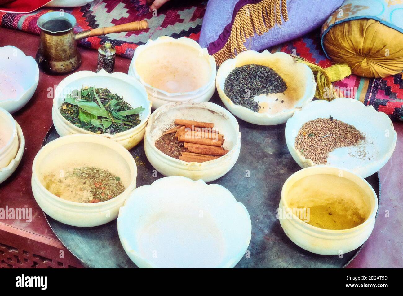 Spices in half-empty bowls for sale on the market. Trade of spices at ...