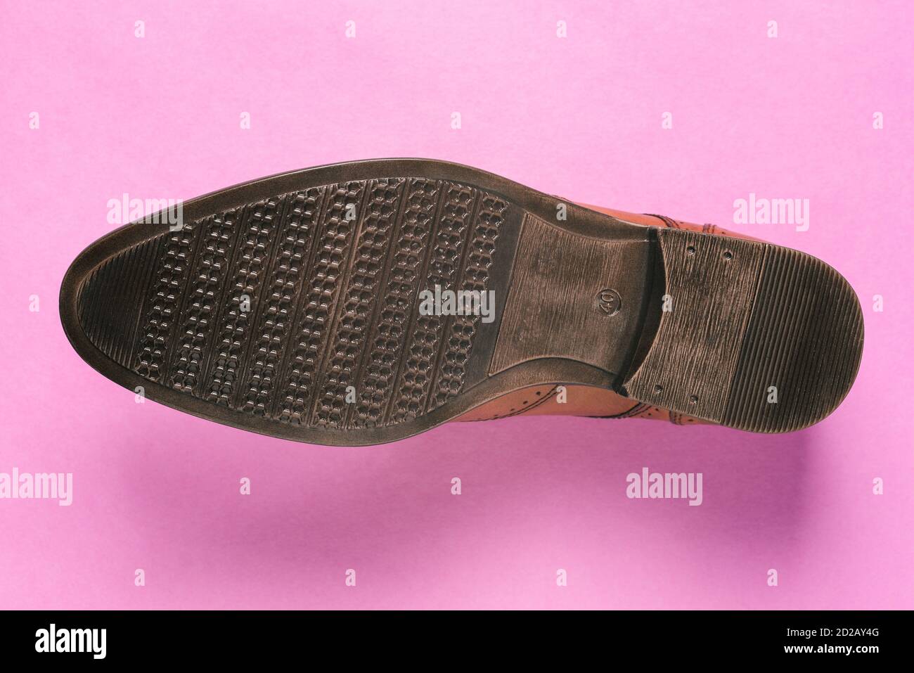 Sole of the Shoe is isolated on a purple background. The sole of a ...