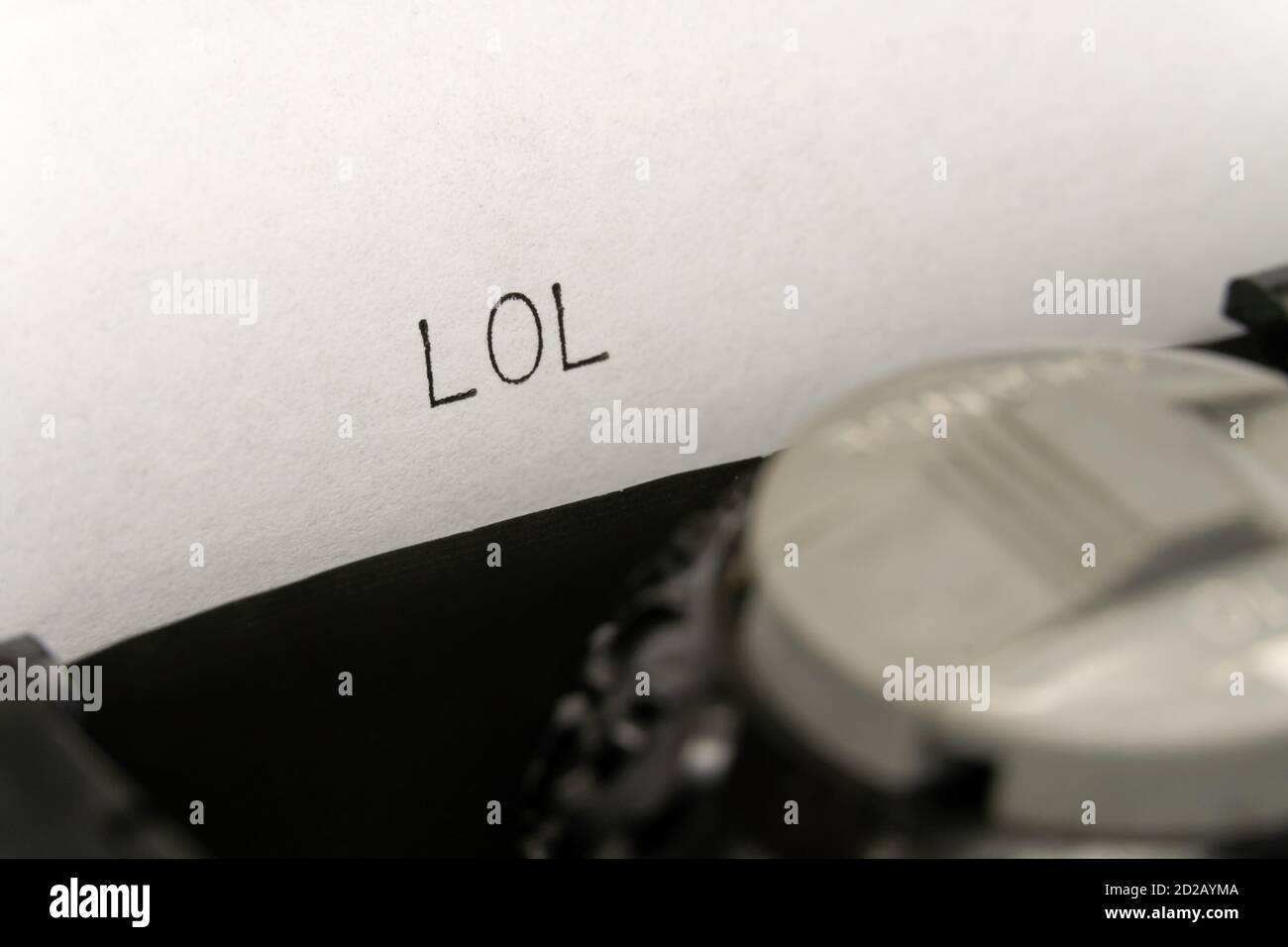Close up printed text Lol on an old typewriter Stock Photo - Alamy