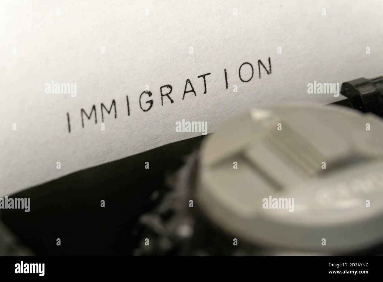 Close up printed text Immigration on an old typewriter Stock Photo - Alamy
